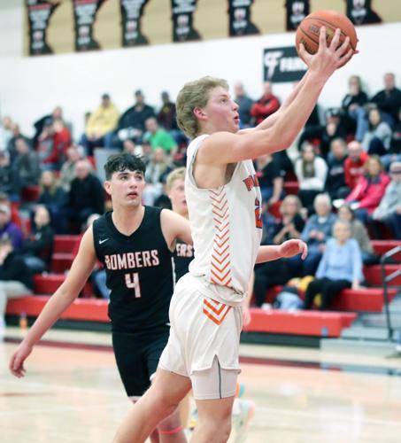 Bombers hold off Rockets for first-round Section 1AA boys basketball ...