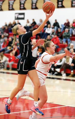 Bomber girls basketball holds off Rockets for second win of the season ...