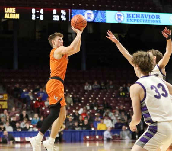 Always up to the challenge: Lorenson is All-Area boys basketball Player ...