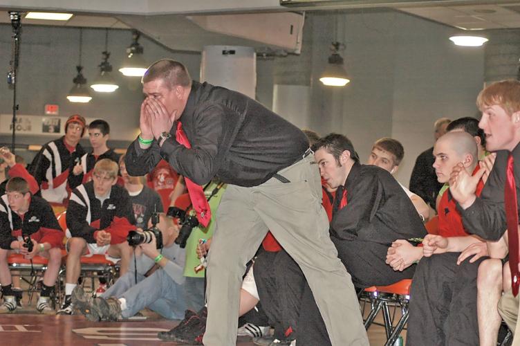 Coach Kirk Davis steps down from coaching wrestling; leaves behind a ...