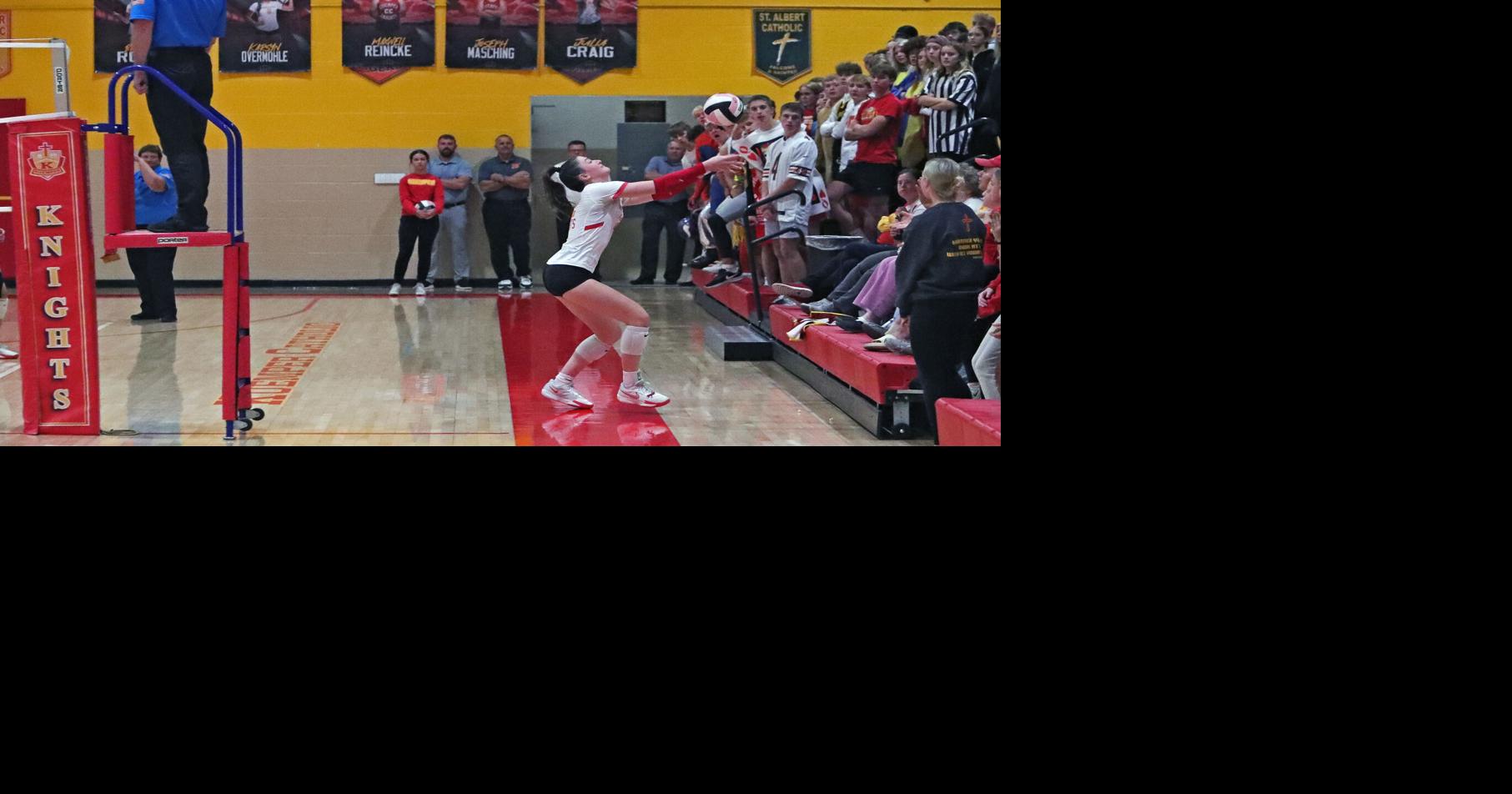 Kolbi Peter digs a ball to keep it inbounds against Des Moines ...