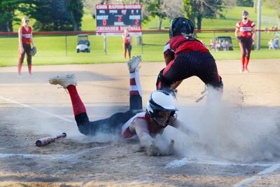 Crusader softball picks up first postseason win, bats come alive ...