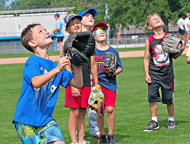Play ball! Merchants coach kids’ clinics | News | carrollspaper.com