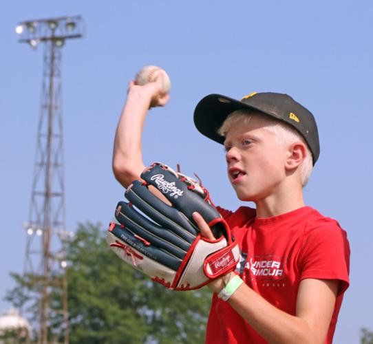 Play ball! Merchants coach kids’ clinics | News | carrollspaper.com