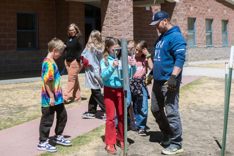 Avery-Parsons kids plant rare apple trees for Earth Day | News ...