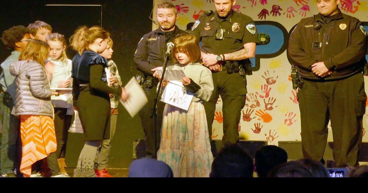 DPCA presents officers with book for kids | Free Content | chaffeecountytimes.com