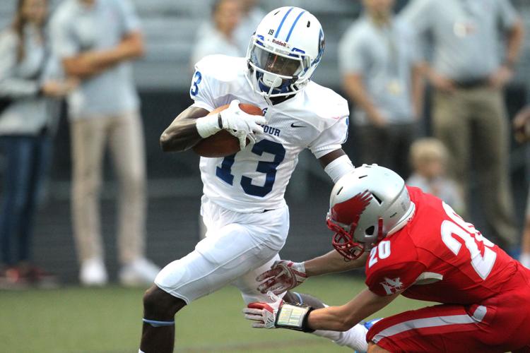 Lancer gridders win third straight against rival Hawken | Gilmour ...