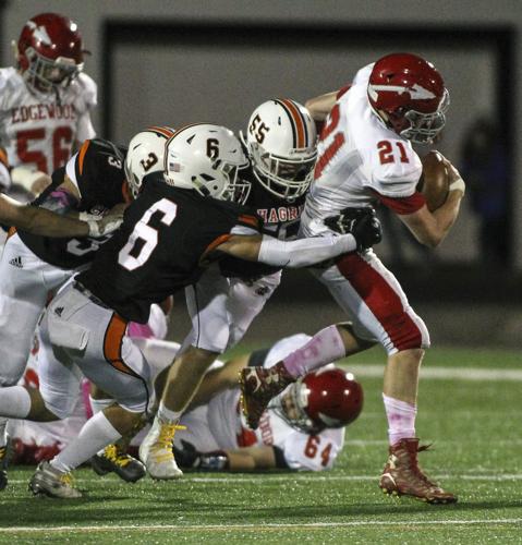 Tiger gridders engineer third straight rout in CVC; West Geauga undone ...