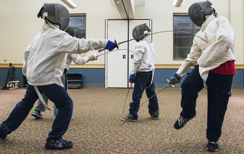 Children & Families: Lunge into fencing - Students learn art of ...