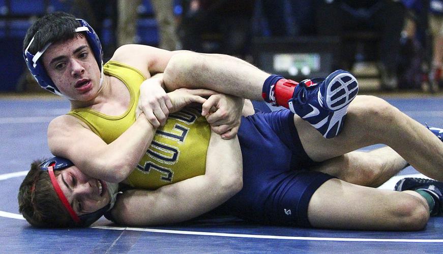 Matmen make way to district tournament - Solon’s Canitano defeats ...