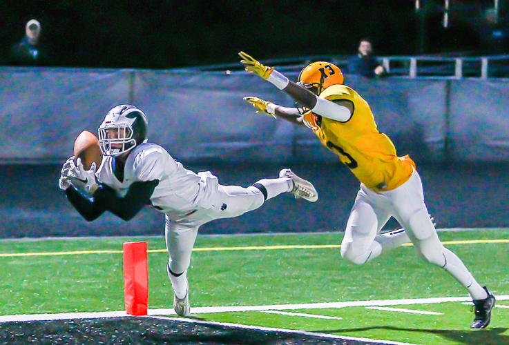 Wolverine gridders run wild on Bison, 49-7: Wickliffe inches by Orange ...