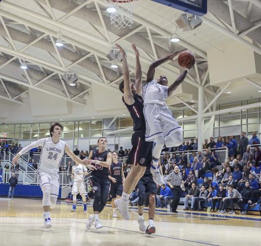 Lancer cagers hold off rival Preppers, 69-61 | Gilmour ...