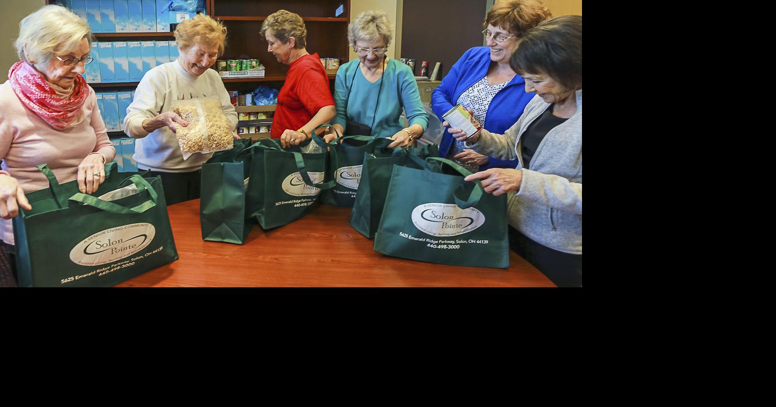 Sacks for Seniors: Volunteers bagging groceries to deliver to elderly ...