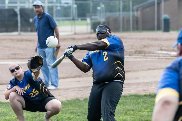 It’s a hit! Beeping ball and buzzing bases draw players into game ...