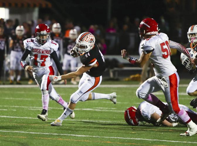Tiger gridders engineer third straight rout in CVC; West Geauga undone ...