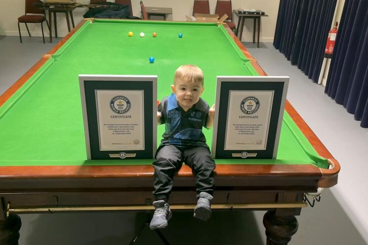 Two-year-old boy sets world record for snooker trick shots | National ...