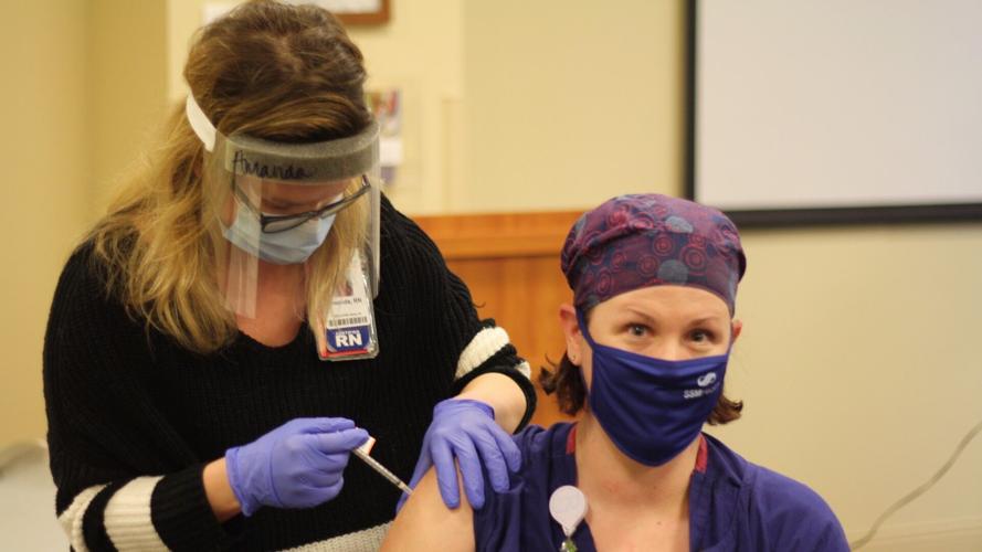 ‘A little glimmer of hope’: SSM Health administers first of its COVID ...