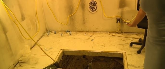 Four charged after suspected cartel tunnel found beneath store near ...