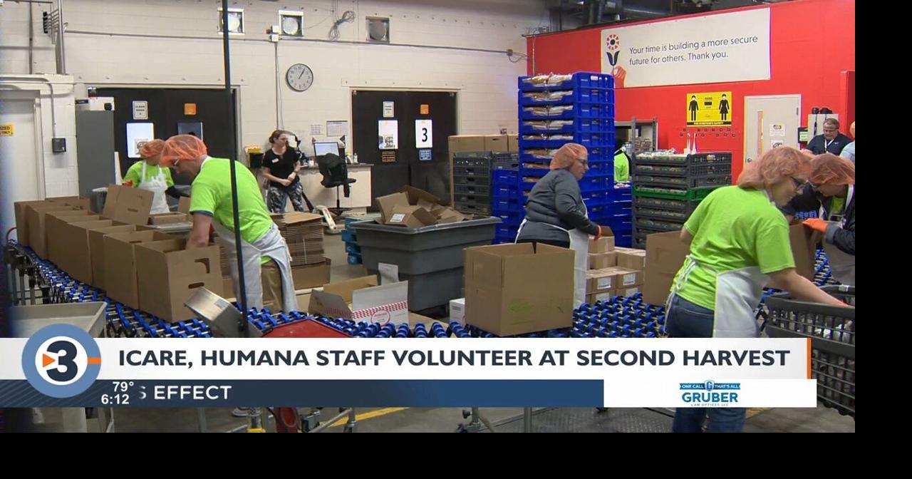 iCare, Humana help pack boxes of food for Second Harvest Foodbank ...