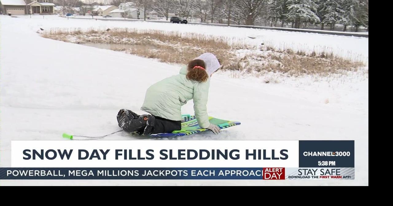 Kids dust off sleds for an unlikely snow day | News | channel3000.com