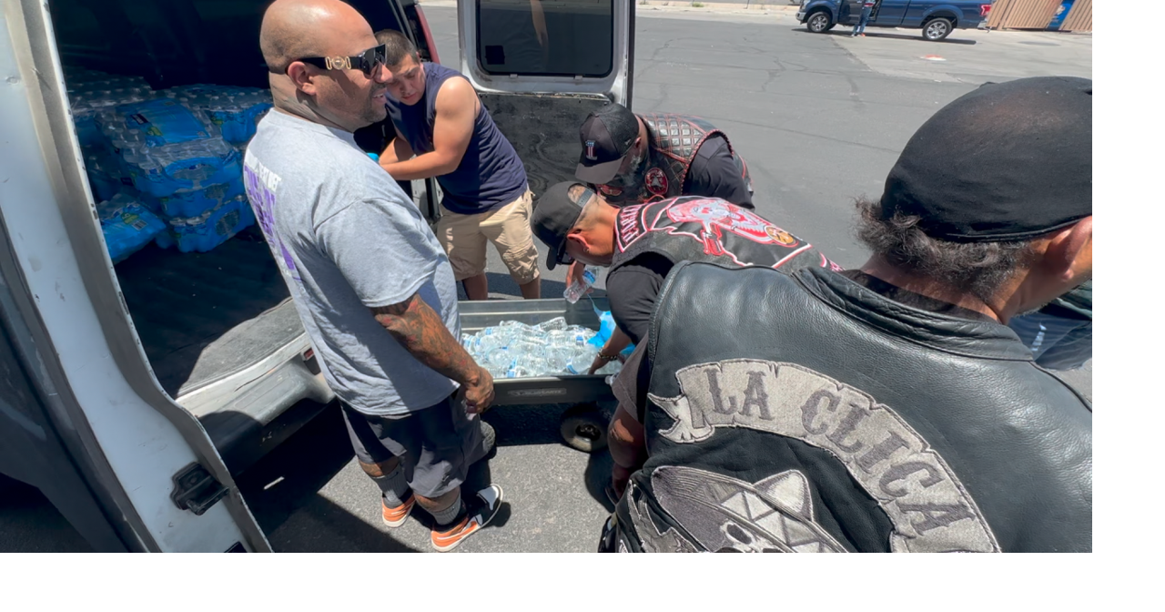 Local DJ hands out 1,600 water bottles to unhoused residents as ...