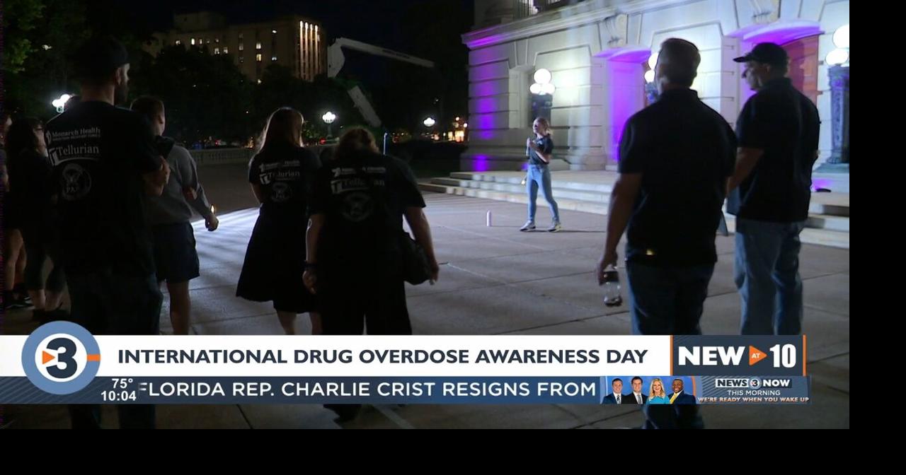 Group marches in downtown Madison for International Overdose Awareness ...