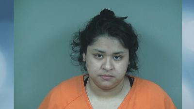 Woman arrested after allegedly assaulting man, using rock to shatter ...