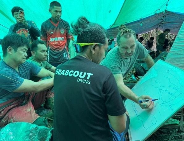 Survivor rescued from flooded Laos cave but remaining group faces ...