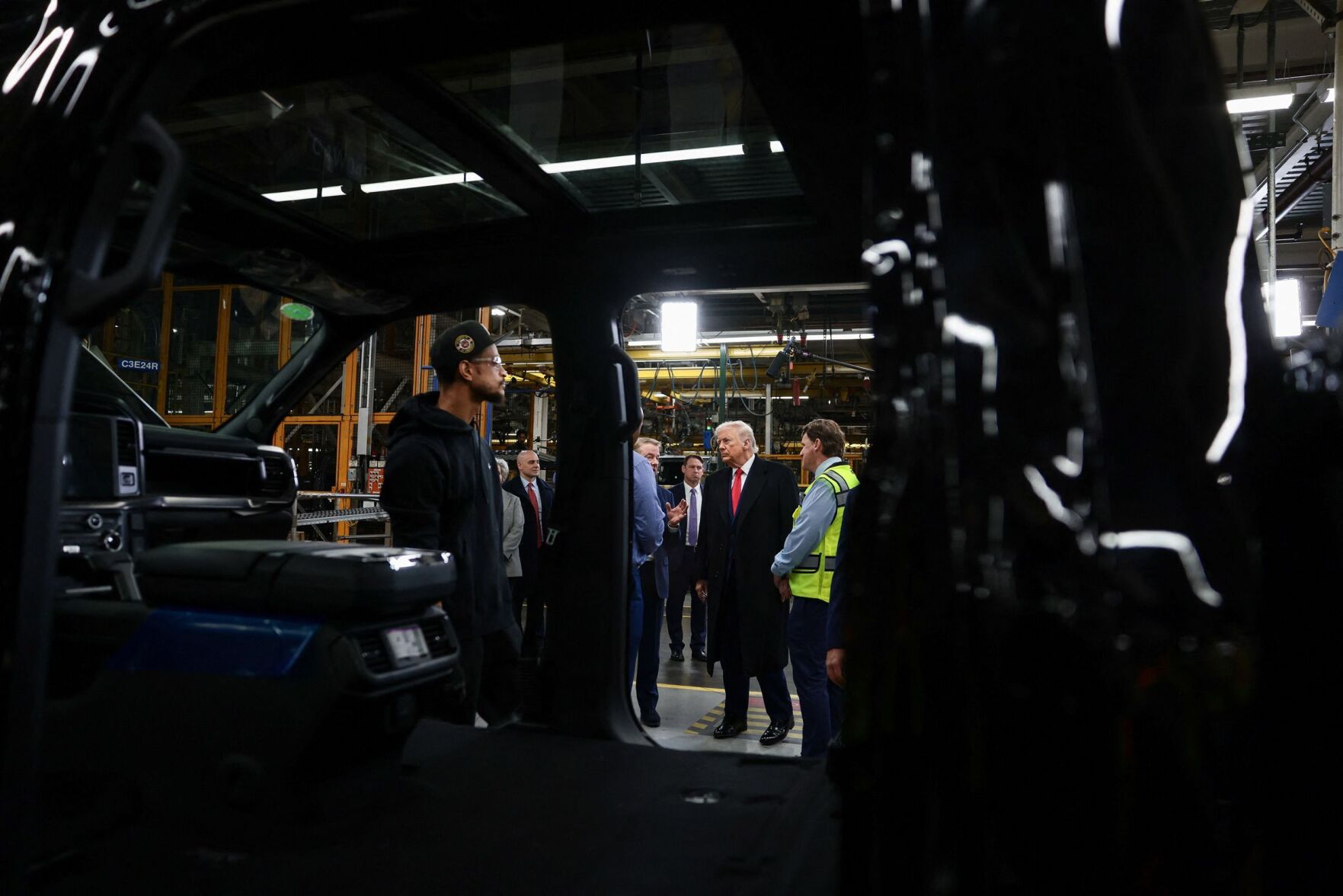 Trump appears to flip someone off at a Ford plant. The White House says ...