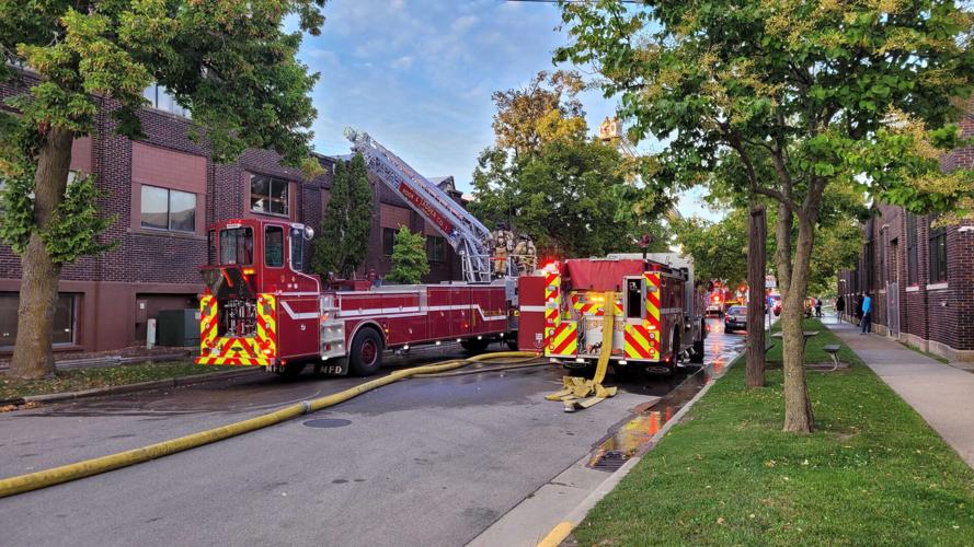 Firefighters extinguish fire on roof of downtown Madison building ...