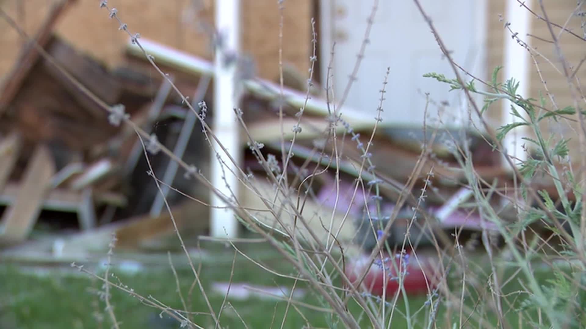 Mother and baby escape serious injury after truck slams into home ...