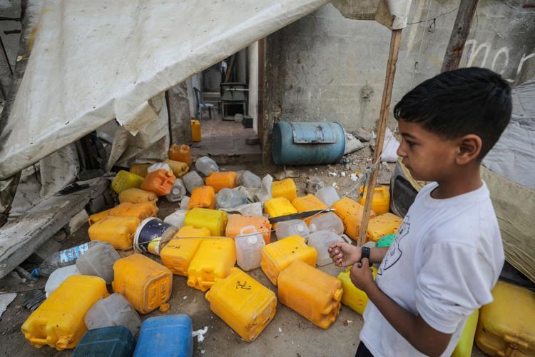 Children killed collecting water in Gaza, medical officials say, as ceasefire talks hit sticking ...