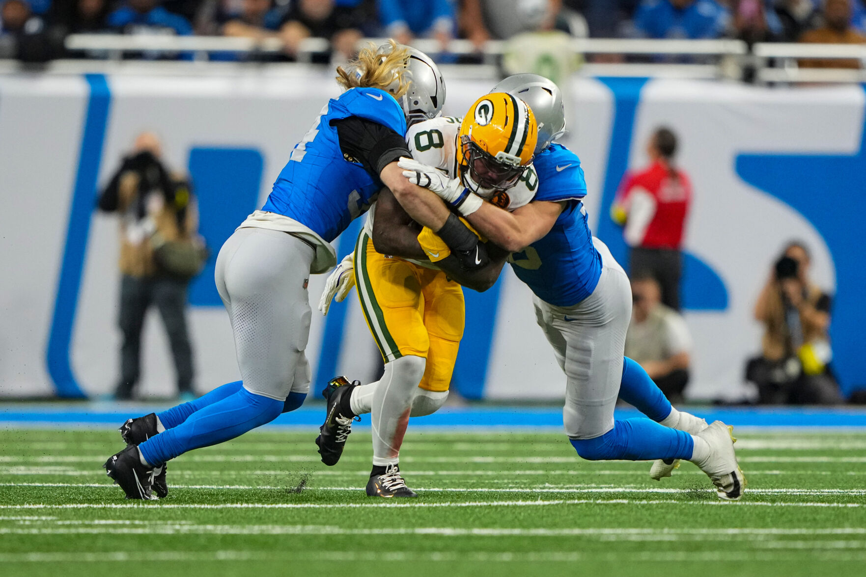 Not practice? Change his bruising play style? Packers running back Josh ...