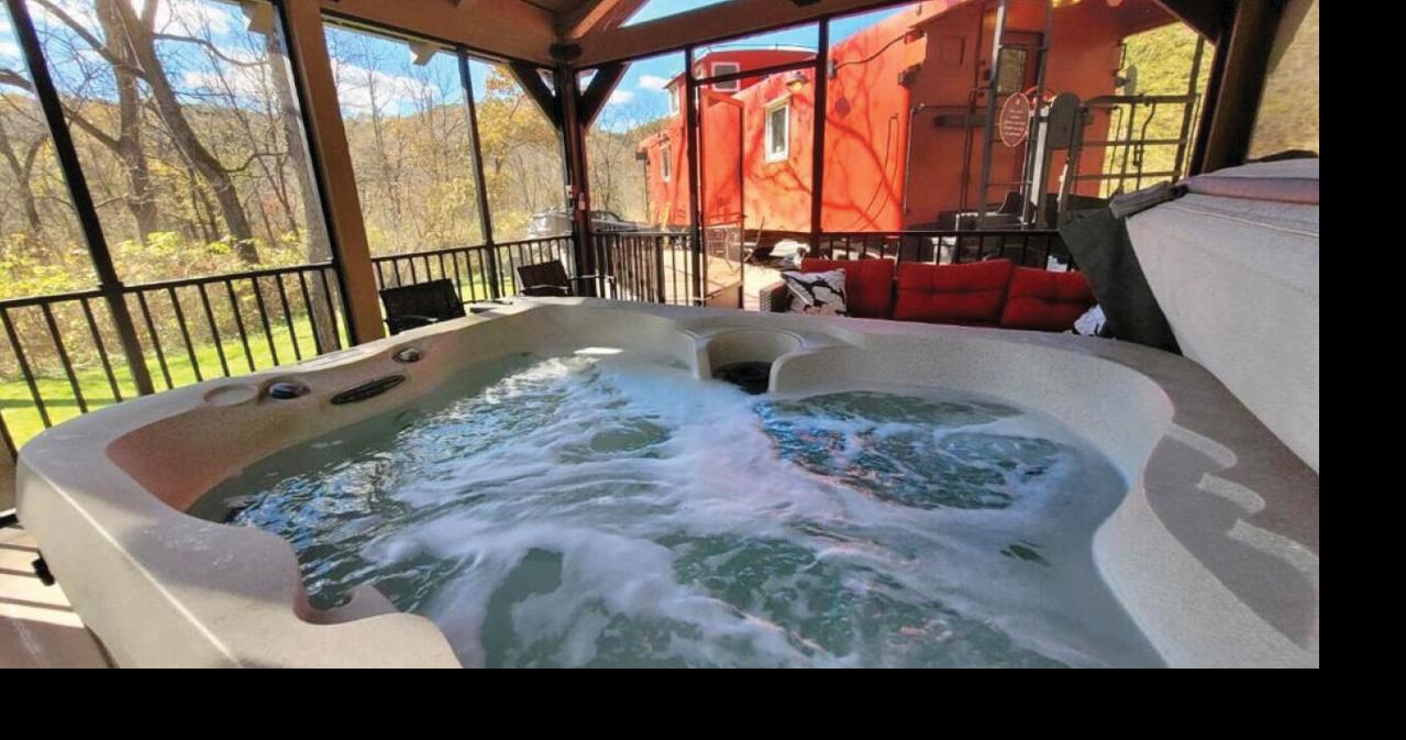 Ferryville home looks like an old train caboose, but has a log cabin ...