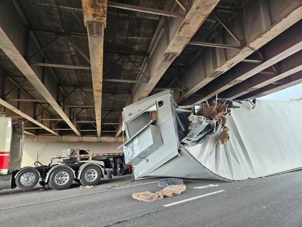 Truck gets stuck under bridge on Colorado interstate | National and ...