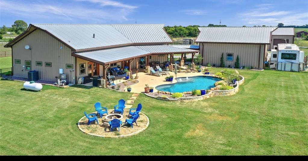 Check out this barndominium in Celina with a pool featuring panoramic ...
