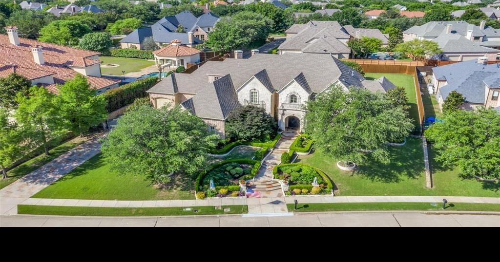 A Frisco home that sits on a 27,000 square foot lot features 22-foot ...