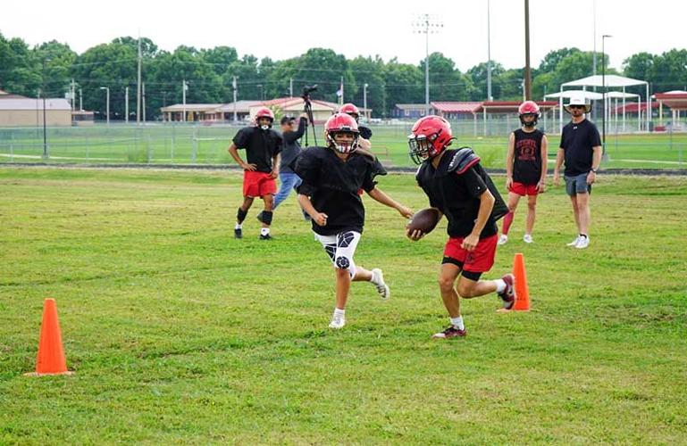 From soccer to football, Catron continues to test her kicking skills ...