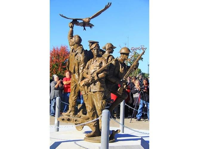 Life-sized bronze statue unveiled for veterans | Multimedia ...