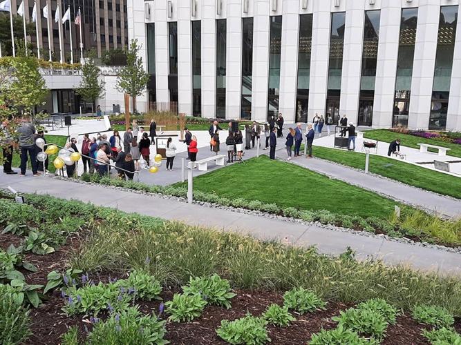 Aon Center unveils updated South Plaza | New Eastside ...