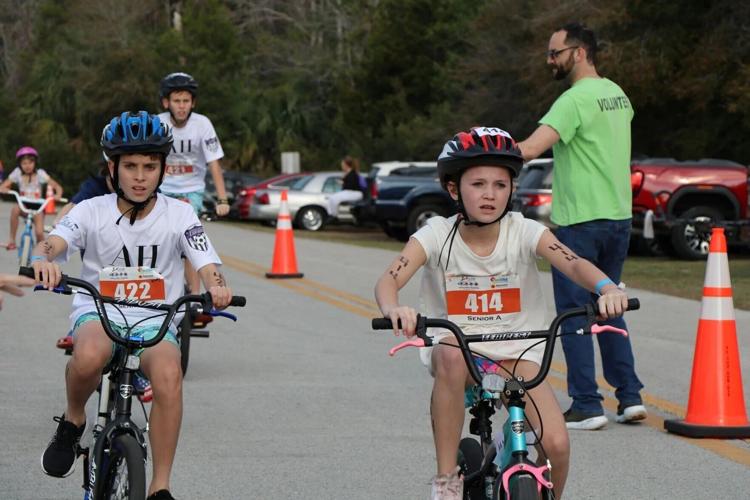 Swim, bike, run — go! 13th annual Kids Triathlon promotes health ...