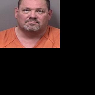 CCSO SWAT team arrests man on a charge of shooting own car in open ...