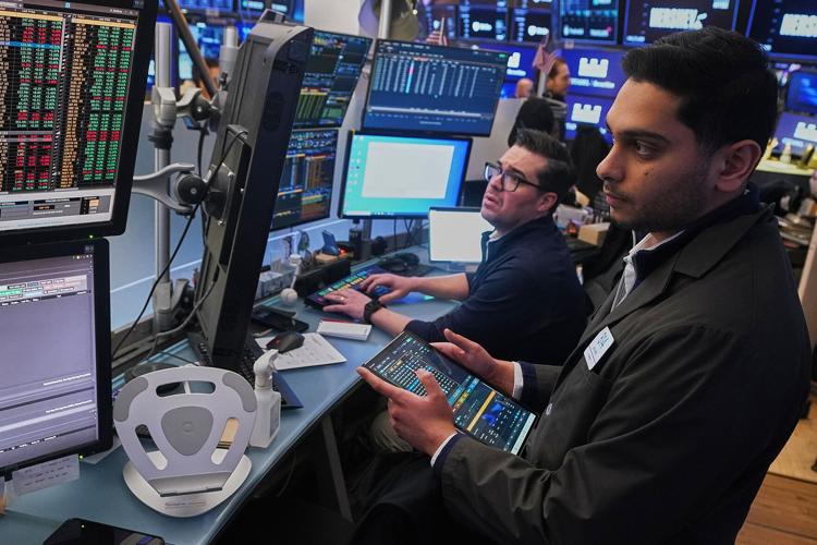 Wall Street drifts in mixed trading as Intel tumbles | National ...