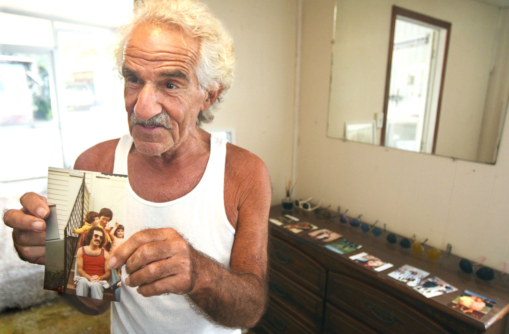 Once homeless, estranged from his son for 25 years, Leonard Berger now ...