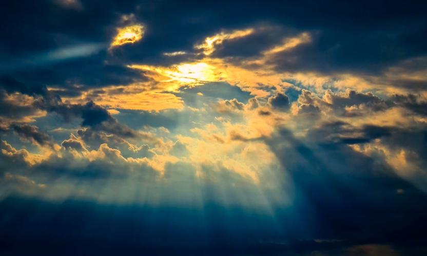 dark clouds with sunshine