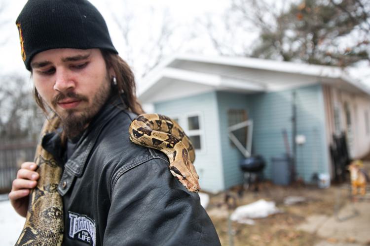 Firefighter rescues 6-foot python from blaze | News | chronicleonline.com