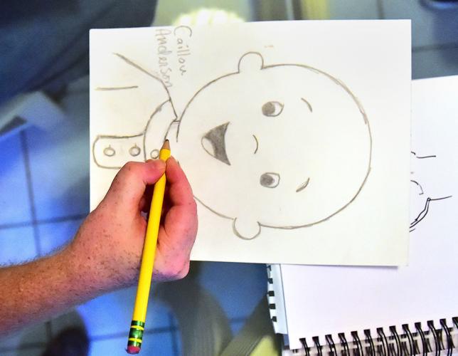 Man with Asperger Syndrome uses his art and music to spread awareness ...