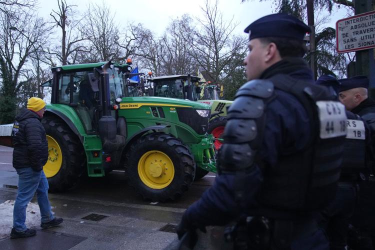 Farmers drive tractors through Paris and block highways in Greece to ...