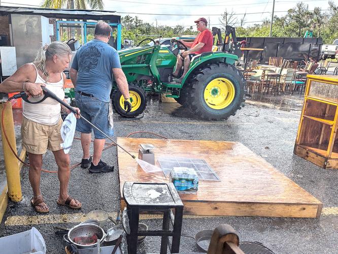 Photo gallery: Helene cleanup begins | Hurricane Guide ...