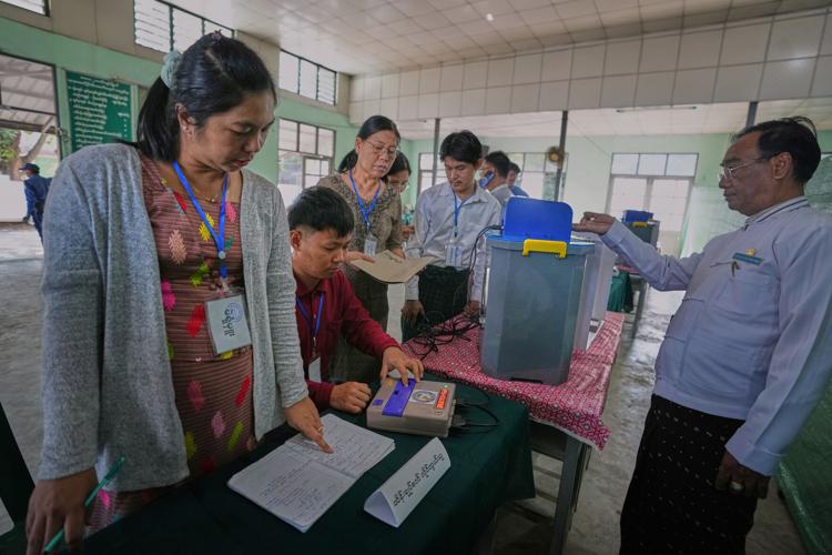 GLIMPSES: Prepping polling machines ahead of Myanmar's weekend election ...